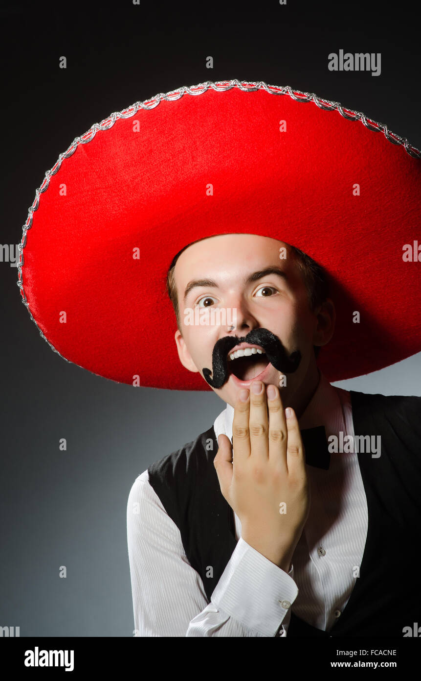 Person wearing sombrero hat in funny concept Stock Photo - Alamy