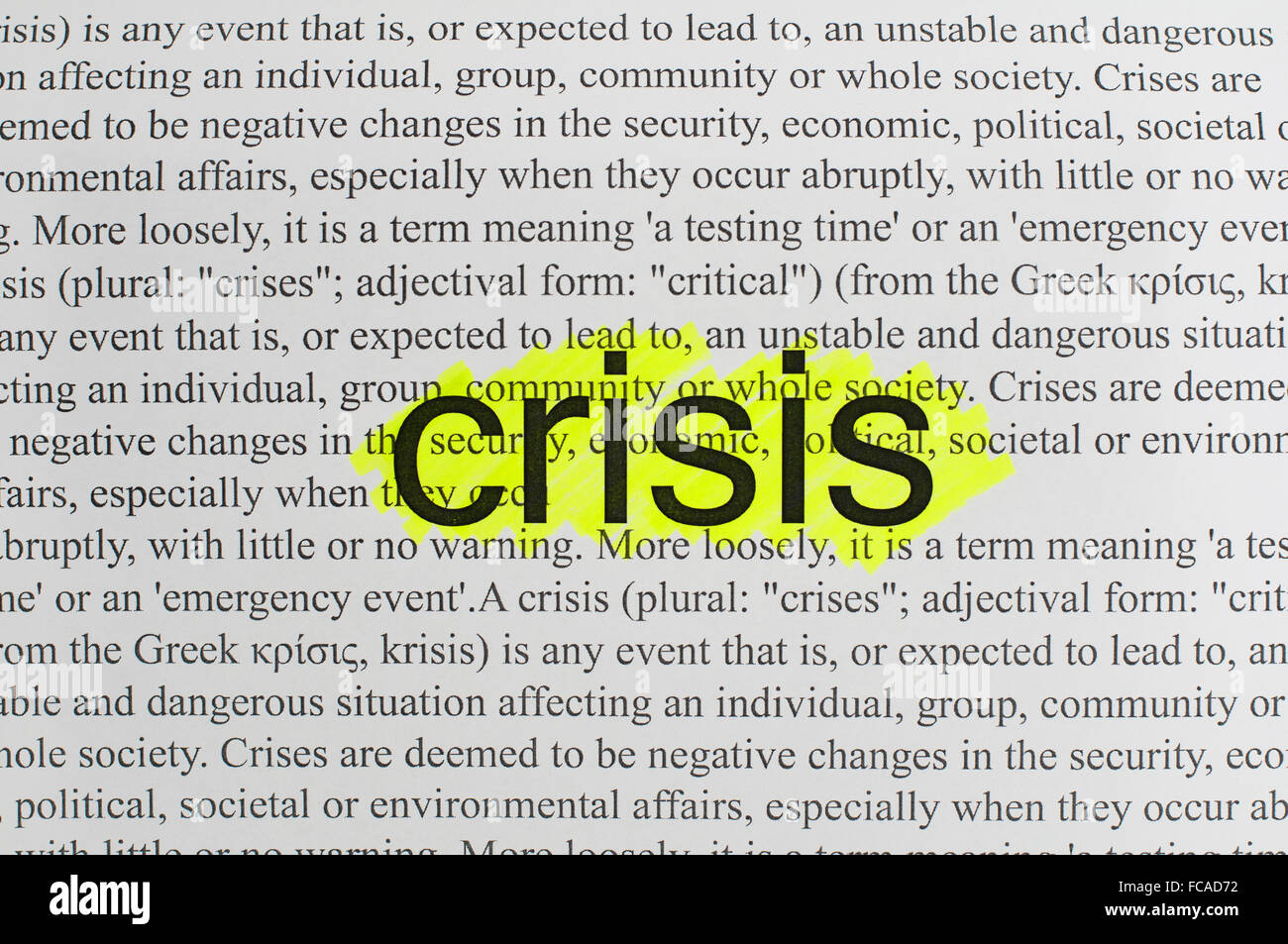 Typed text Crisis on paper Stock Photo - Alamy