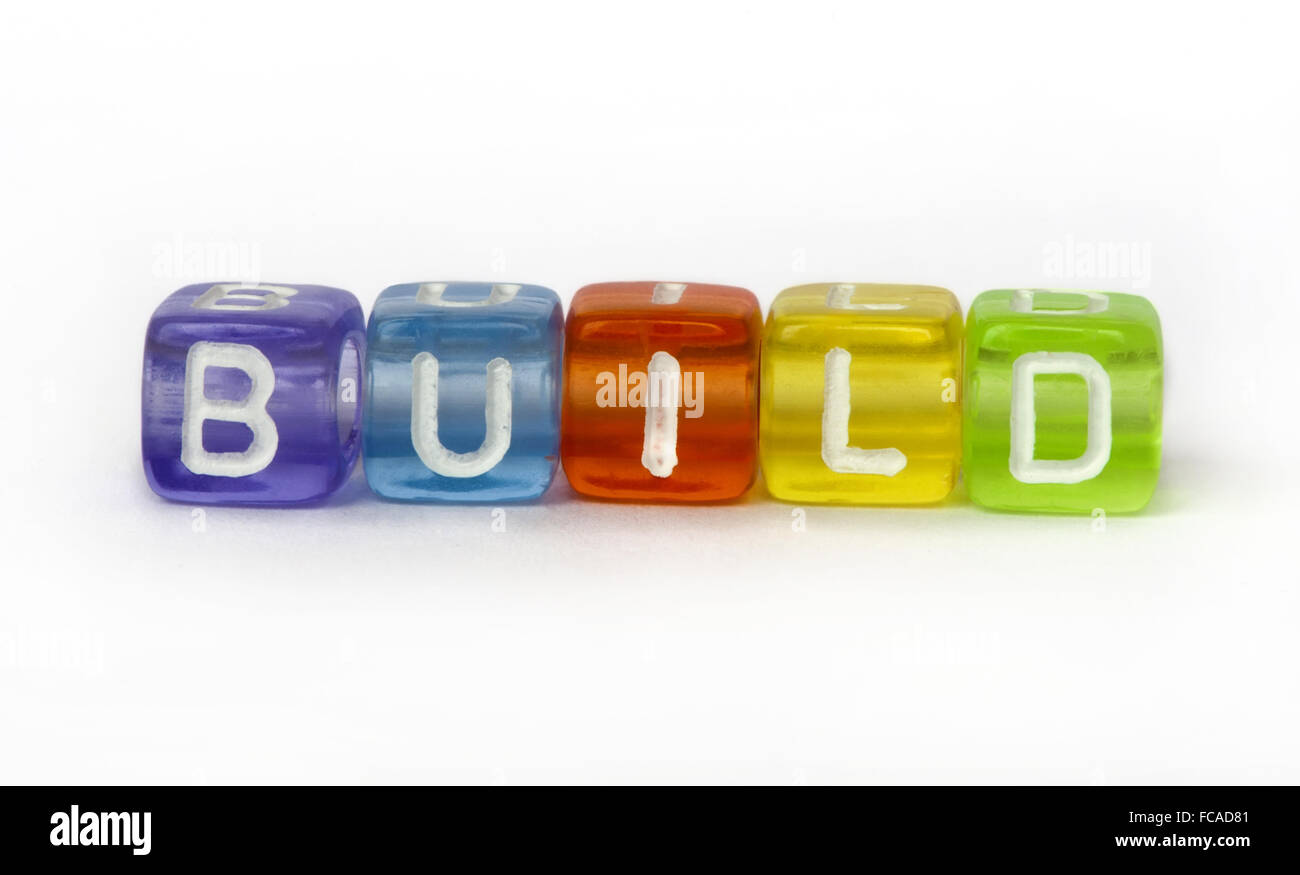 Text build on colorful wooden cubes Stock Photo - Alamy