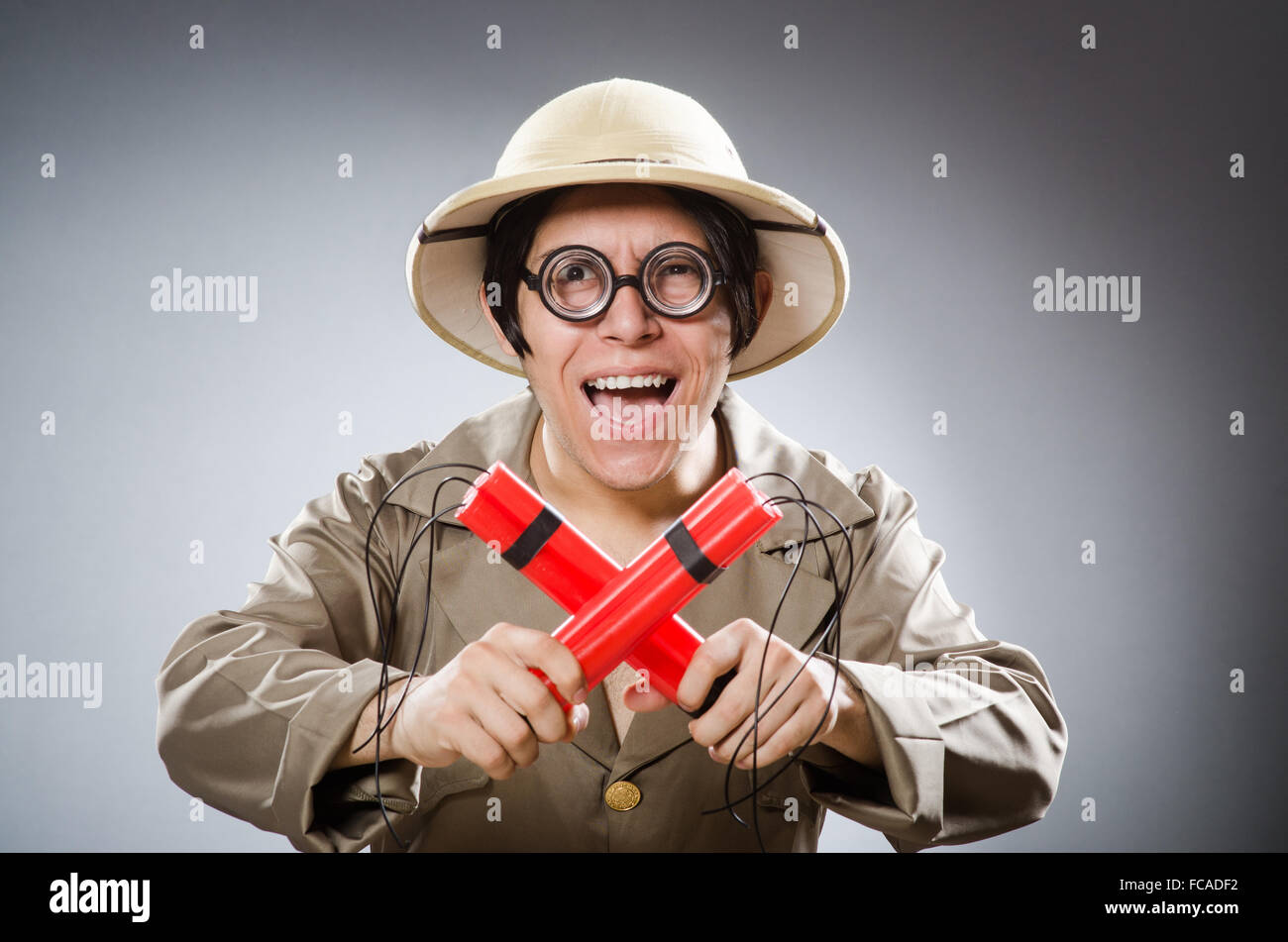 Funny safari traveller in travelling concept Stock Photo - Alamy