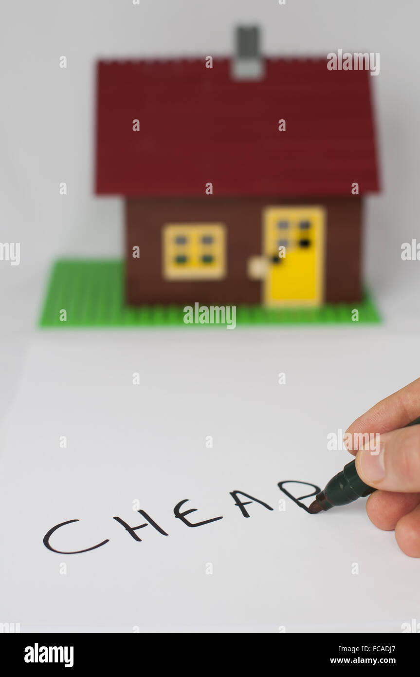 Text Cheap and house on background Stock Photo - Alamy