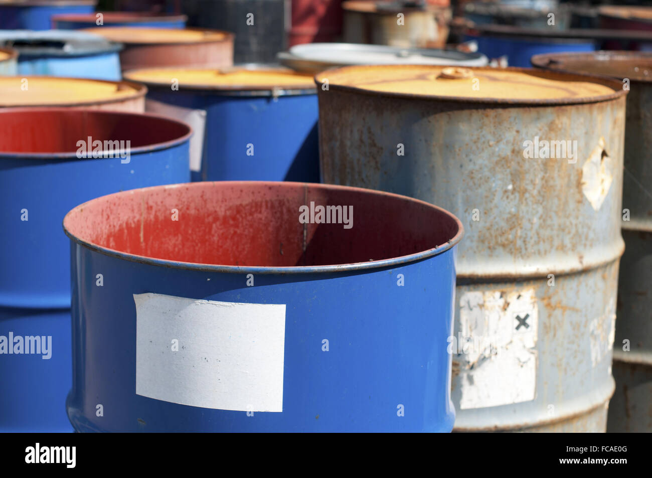 Old colored barrels for oil products Stock Photo - Alamy
