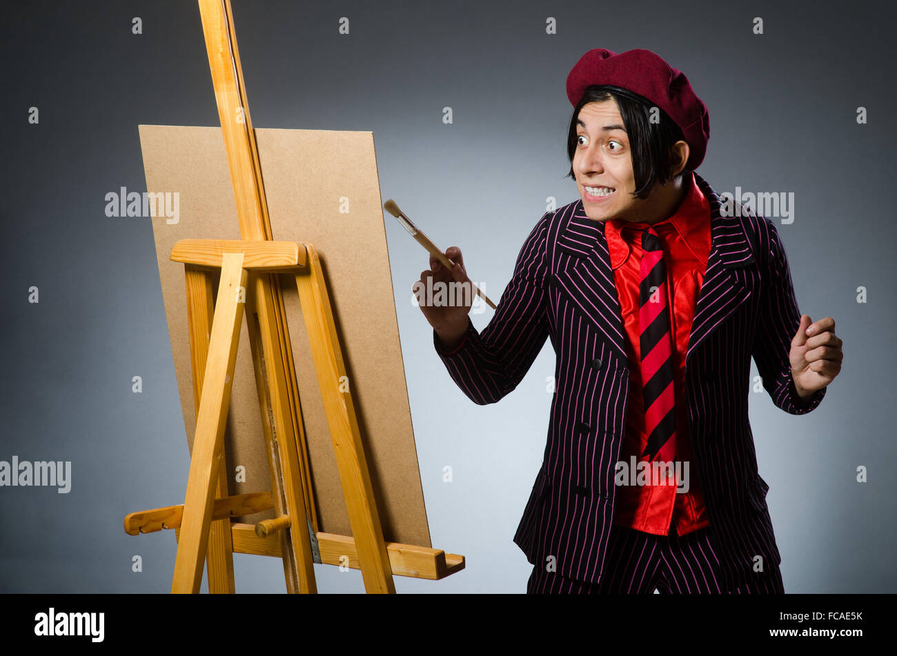 Funny artist with his artwork Stock Photo - Alamy