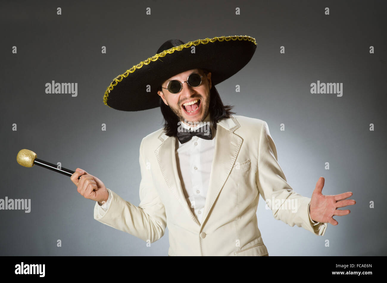 Person wearing sombrero hat in funny concept Stock Photo - Alamy