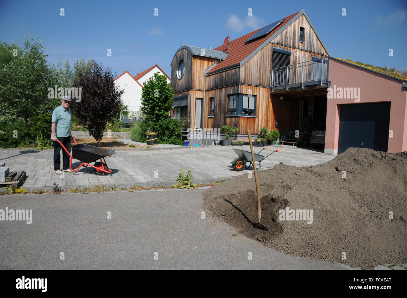 Laying sod, preparing soil Stock Photo - Alamy
