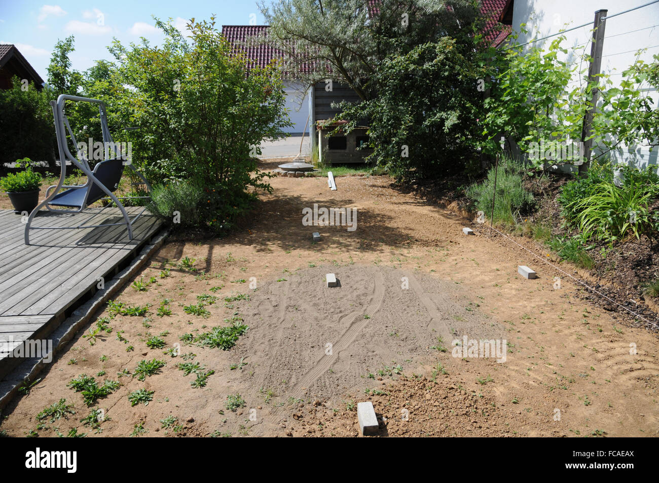 Laying sod, preparing soil Stock Photo - Alamy