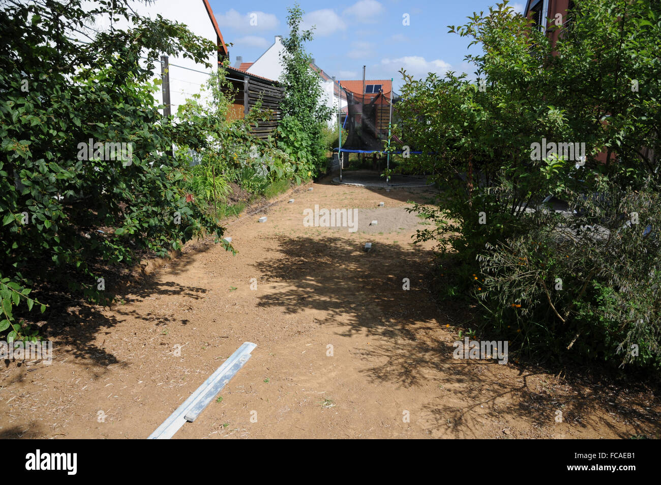 Laying sod, preparing soil Stock Photo - Alamy
