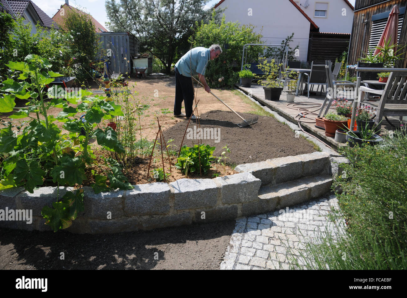 Laying sod, preparing soil Stock Photo - Alamy