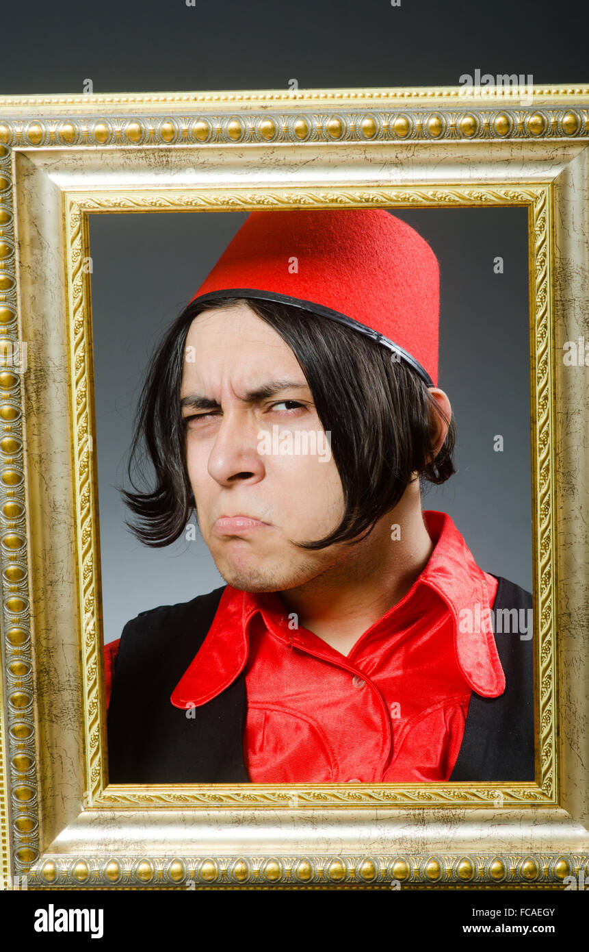 The man wearing red fez hat Stock Photo - Alamy