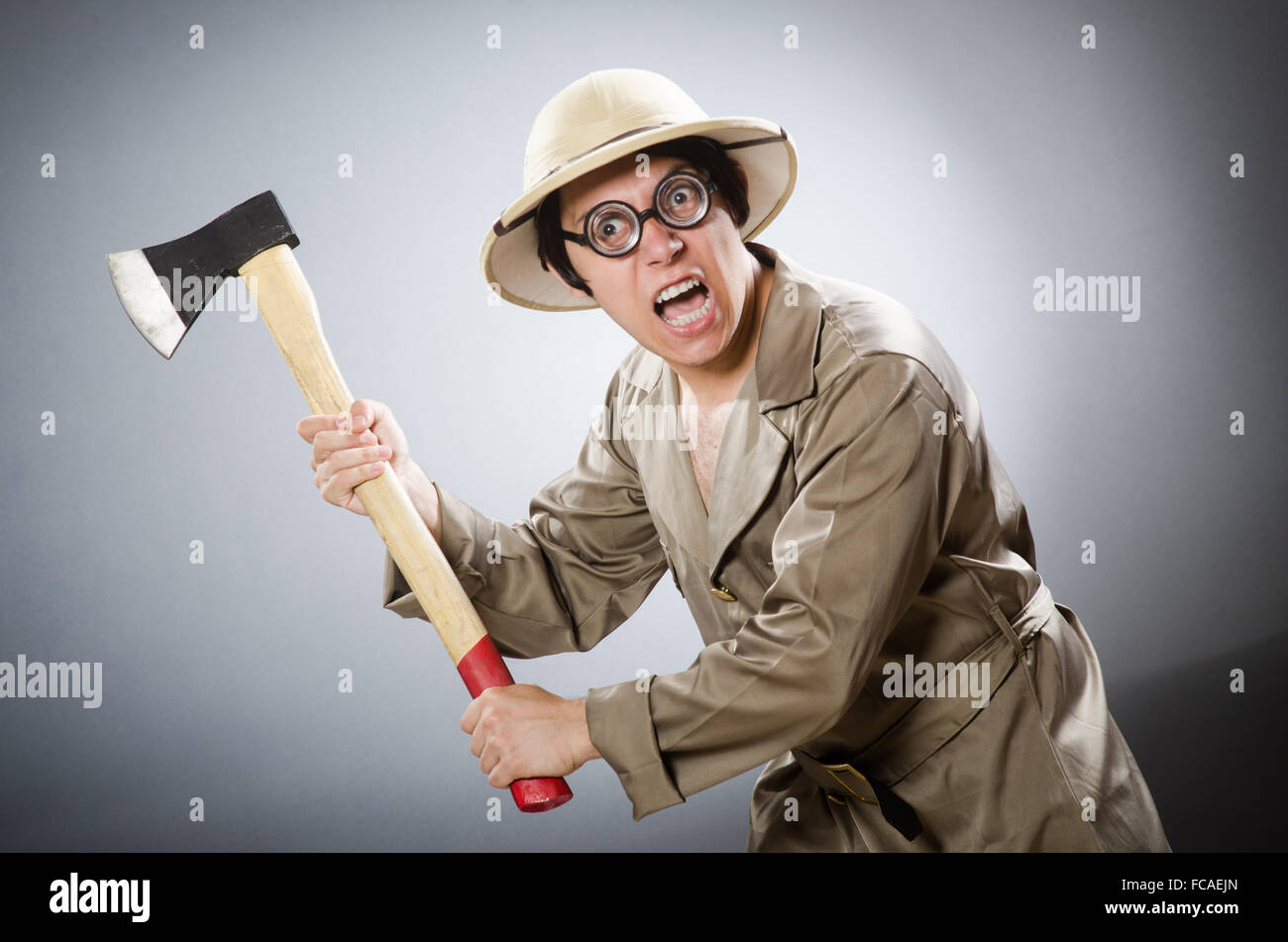 Funny safari traveller in travelling concept Stock Photo - Alamy