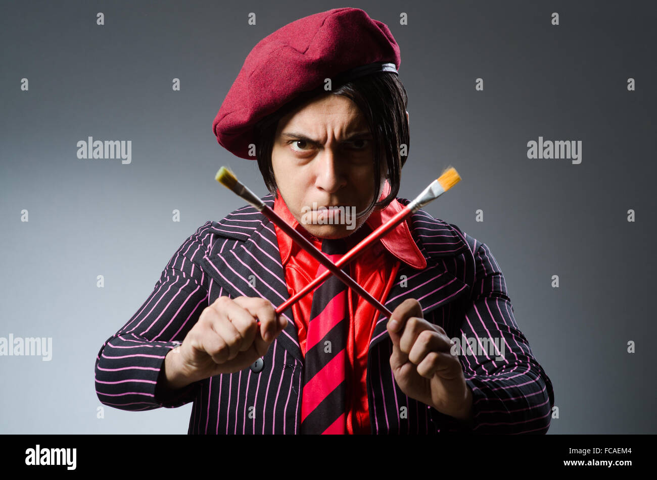 Funny artist with his artwork Stock Photo - Alamy