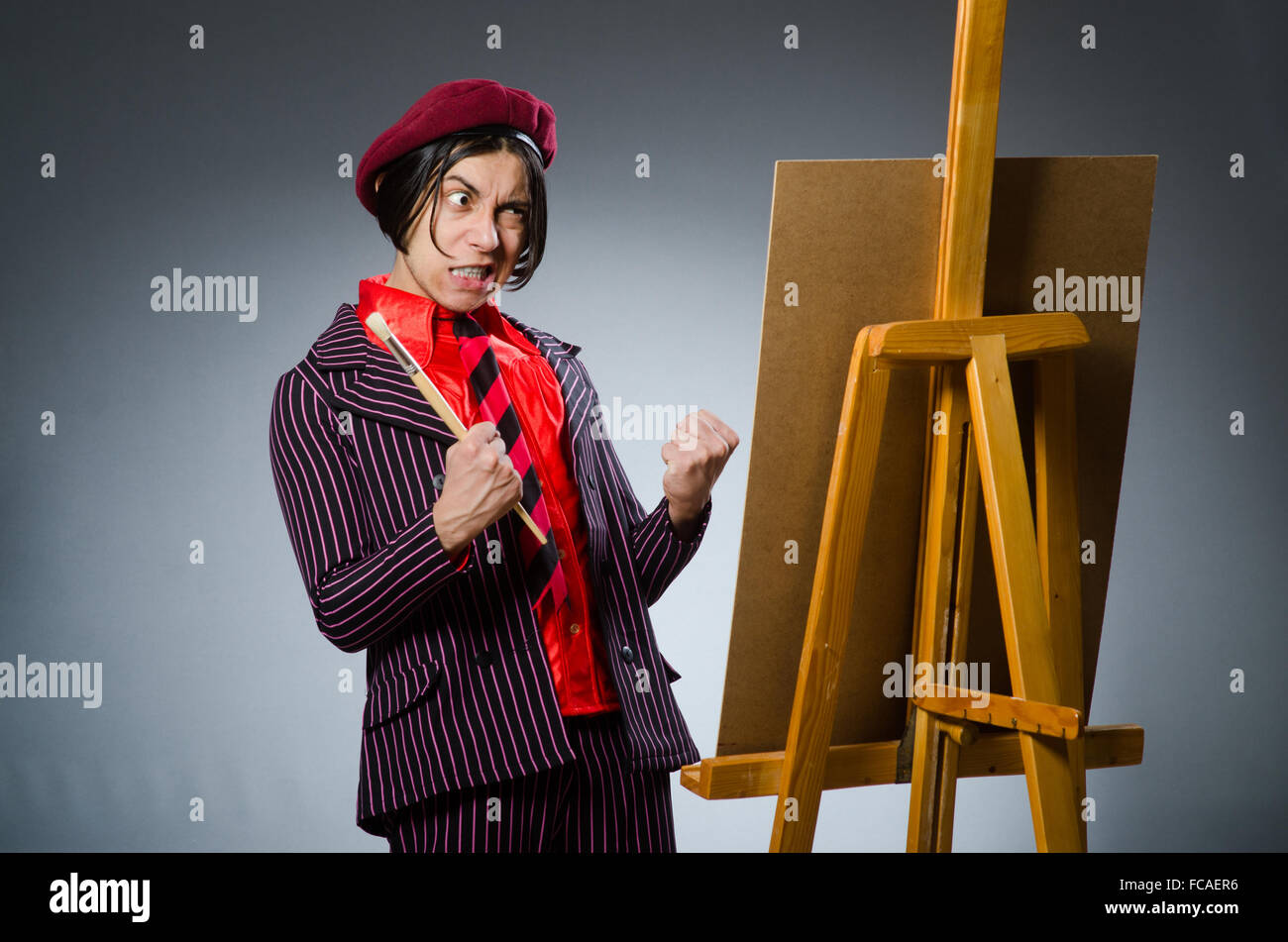 Funny artist with his artwork Stock Photo - Alamy