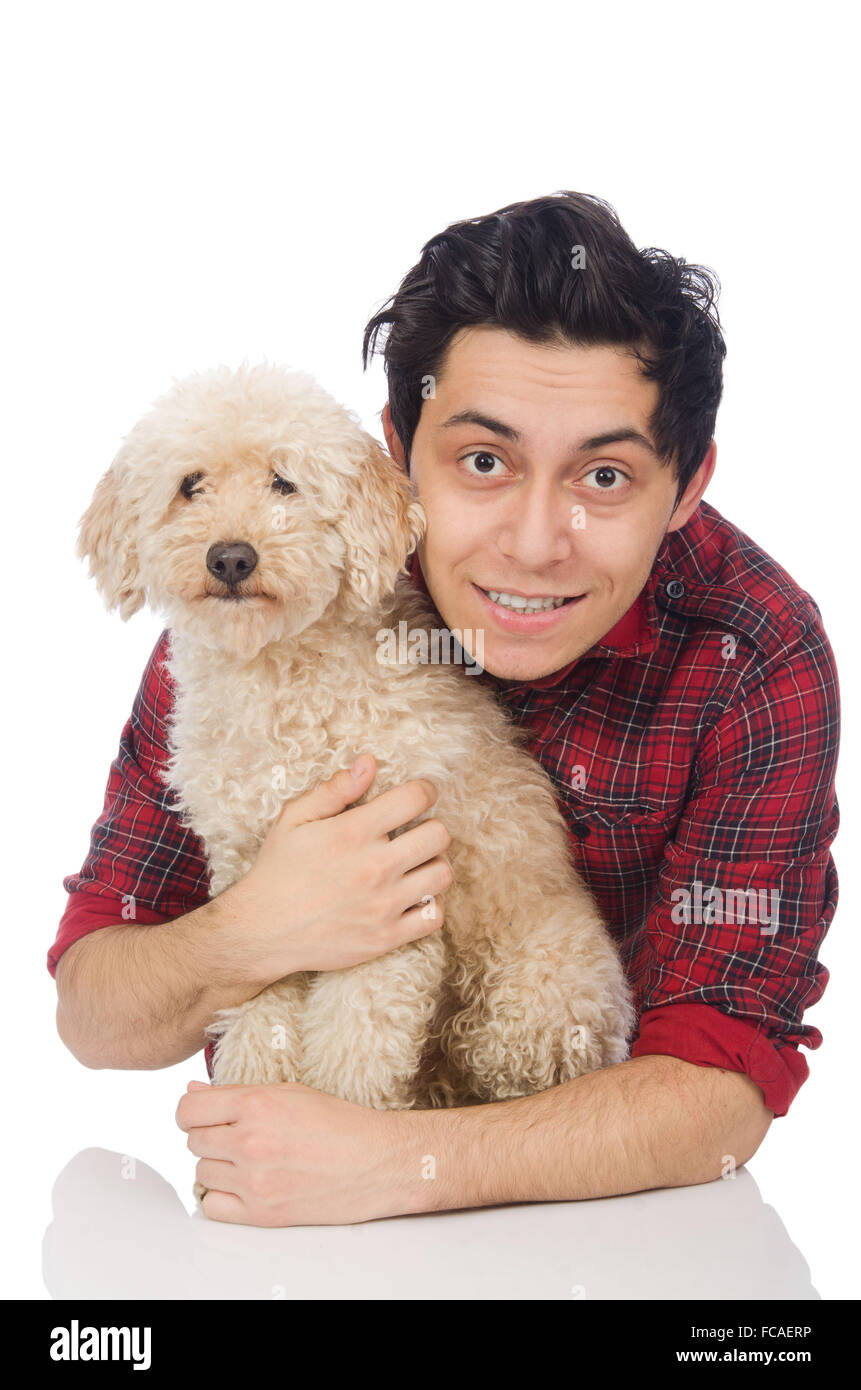 The young man with dog isolated on white Stock Photo - Alamy