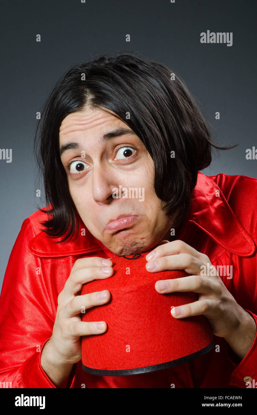 The man wearing red fez hat Stock Photo - Alamy