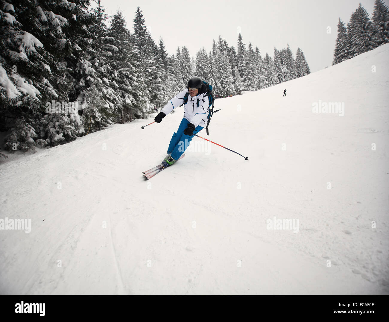 Man skiing on slope - winter holidays Stock Photo - Alamy