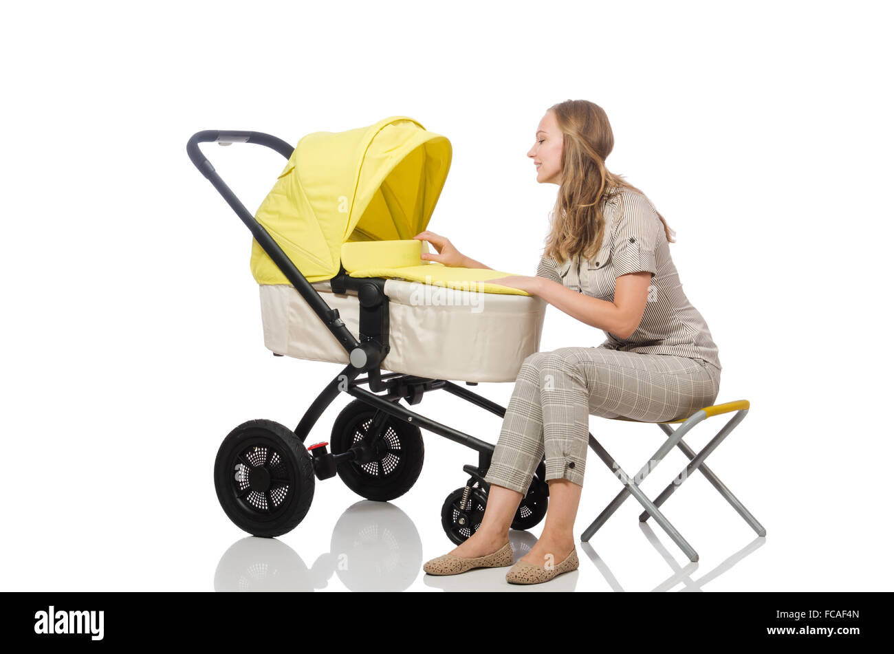 Woman with pram isolated on white Stock Photo - Alamy