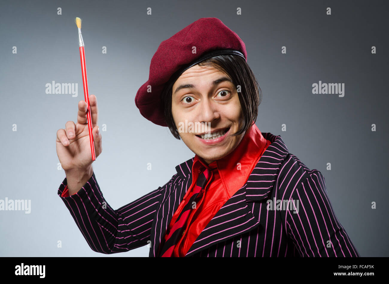 Funny artist with his artwork Stock Photo - Alamy