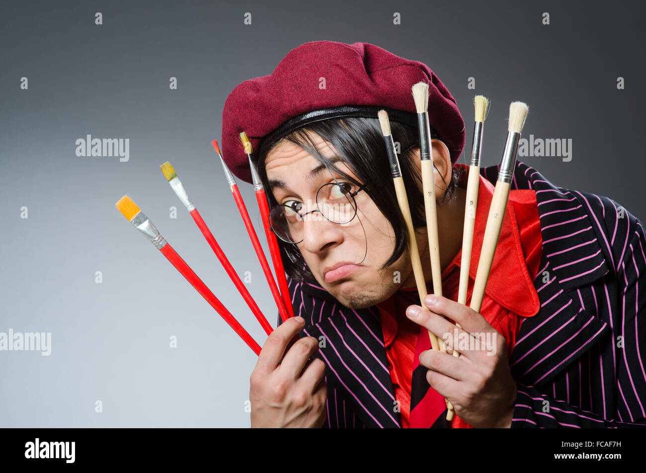 Funny artist with his artwork Stock Photo - Alamy