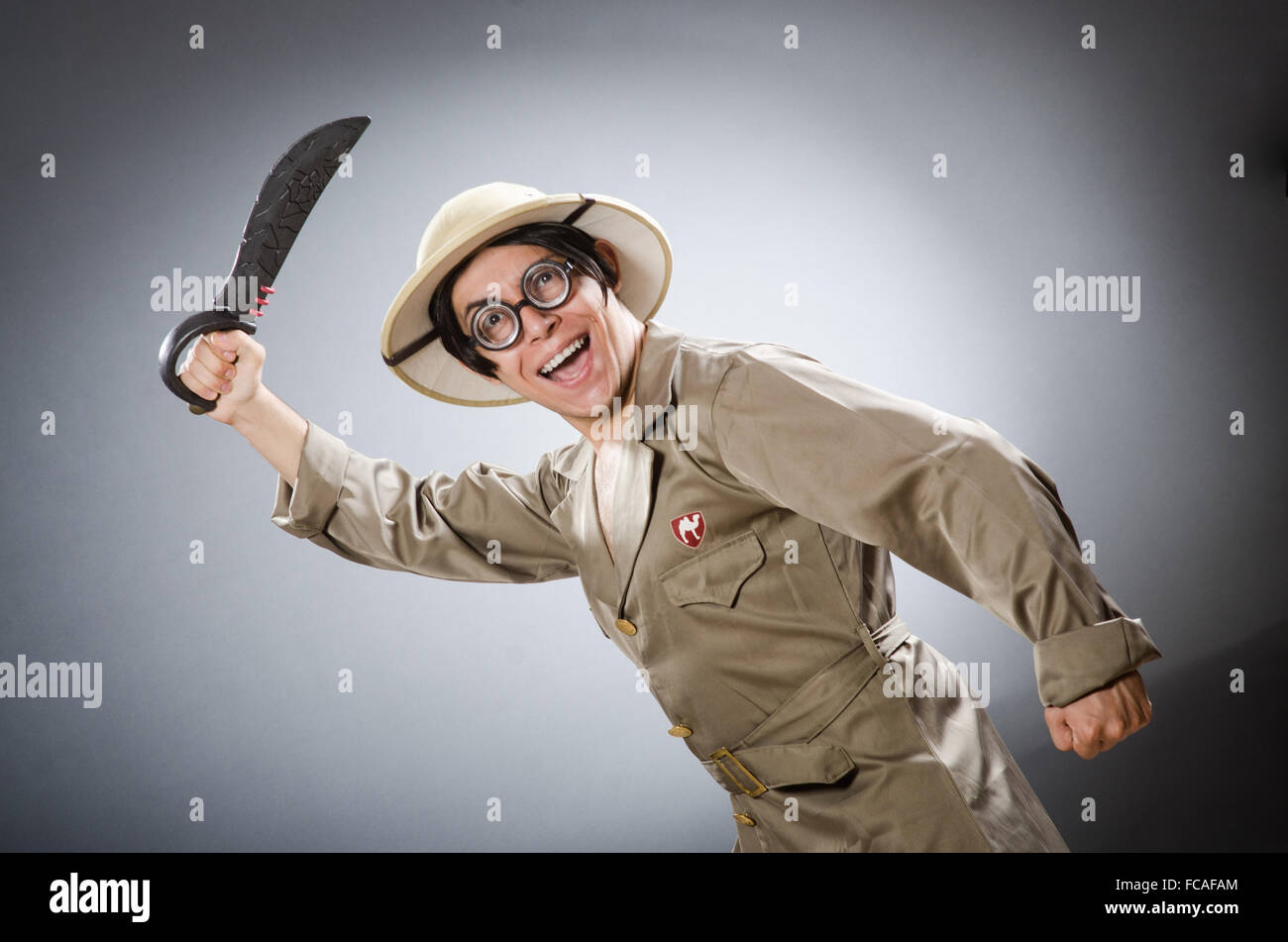 Funny safari traveller in travelling concept Stock Photo - Alamy