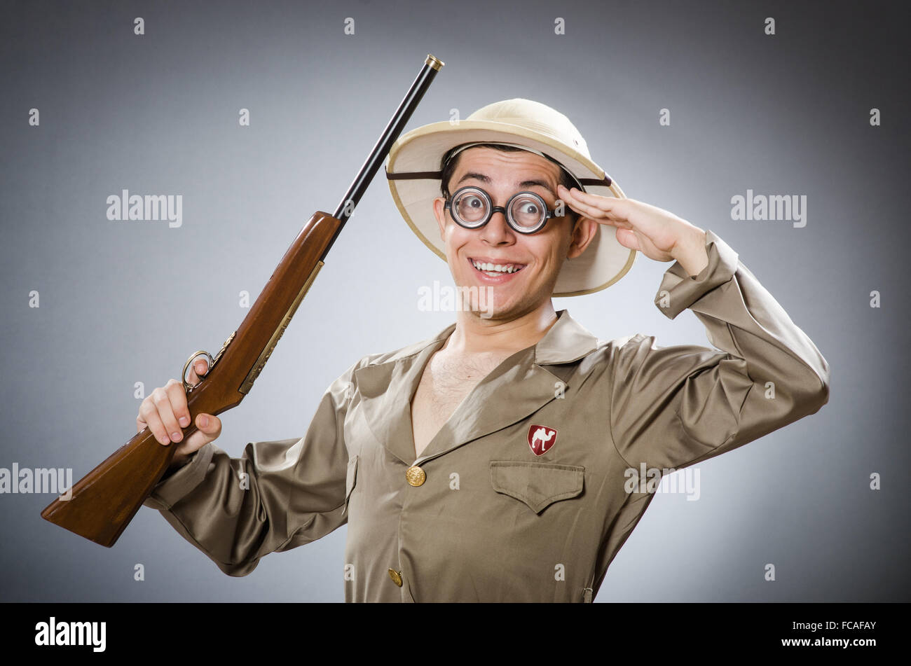 Funny hunter in hunting concept Stock Photo - Alamy