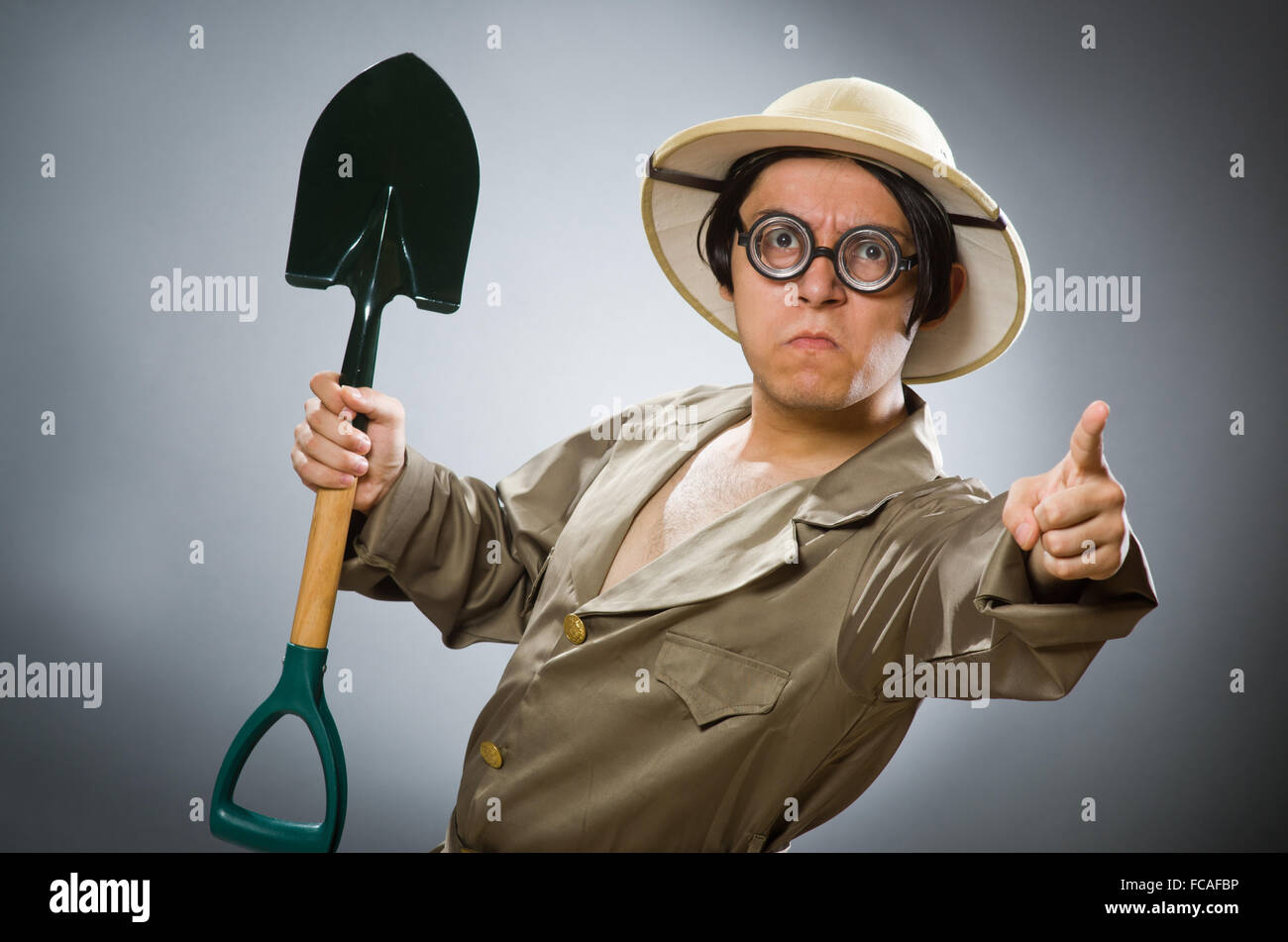 Funny man with the spade Stock Photo - Alamy