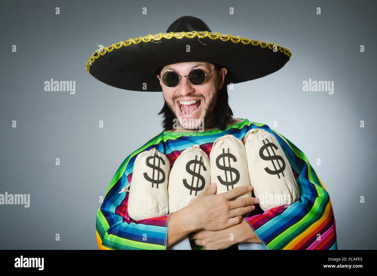 Mexican man with money sacks Stock Photo - Alamy