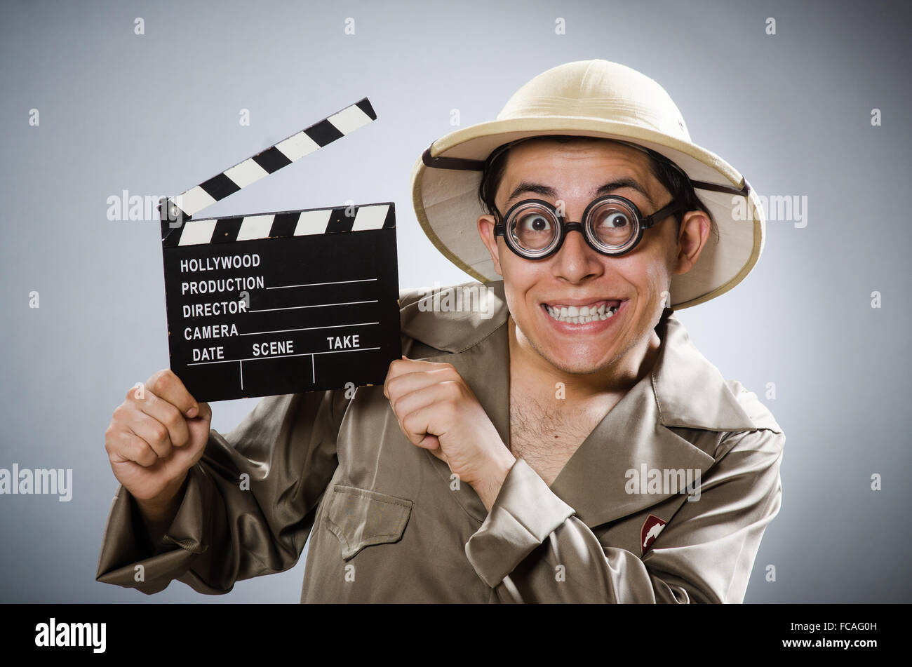 Funny safari traveller in travelling concept Stock Photo - Alamy
