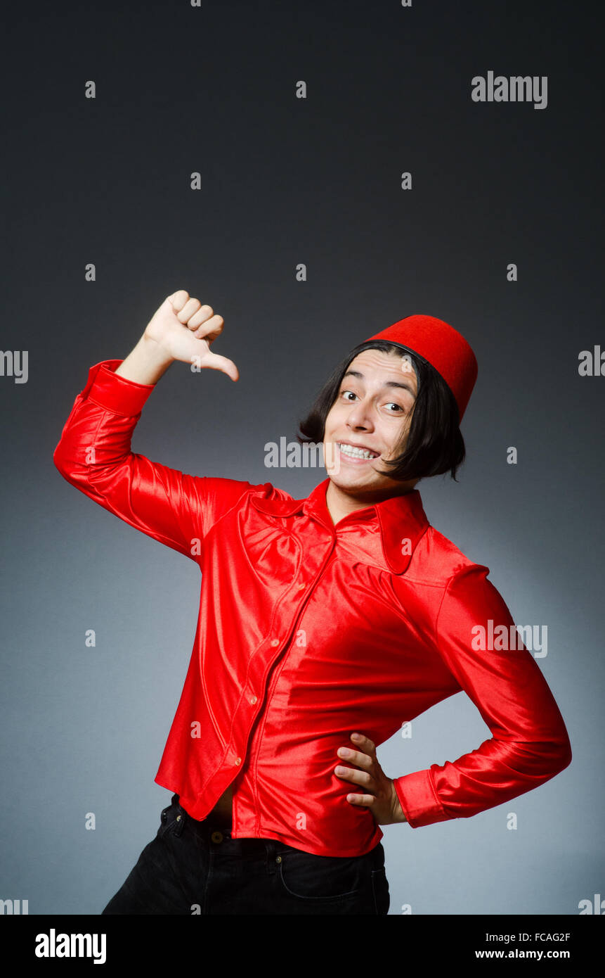 The man wearing red fez hat Stock Photo - Alamy