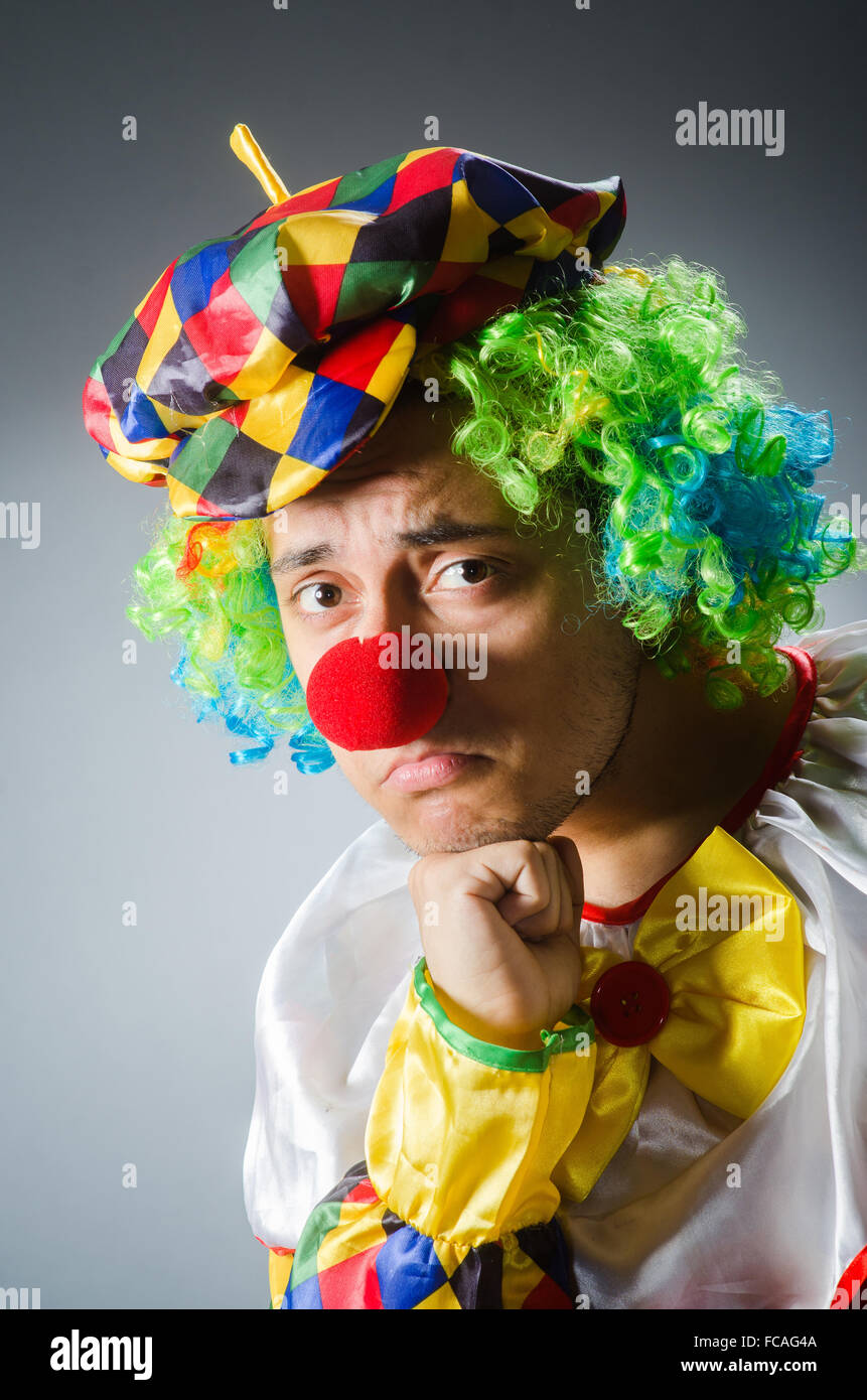 Funny clown in comical concept Stock Photo - Alamy