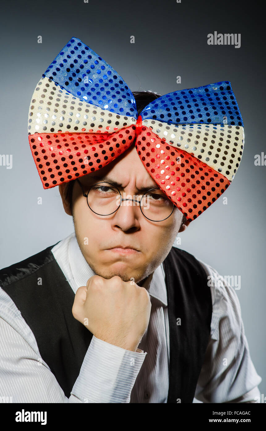 Funny man with giant bow tie Stock Photo - Alamy