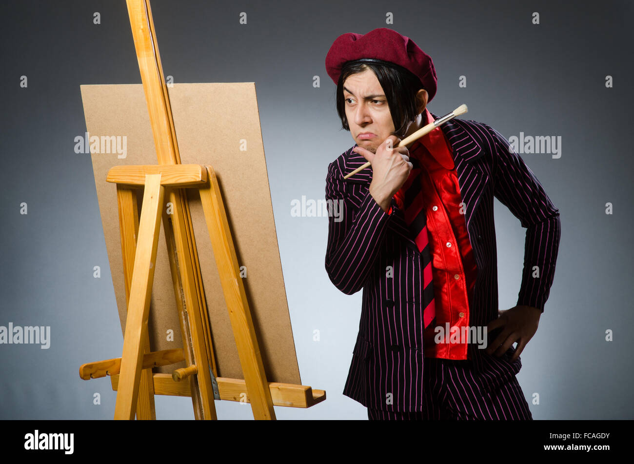 Funny artist with his artwork Stock Photo - Alamy