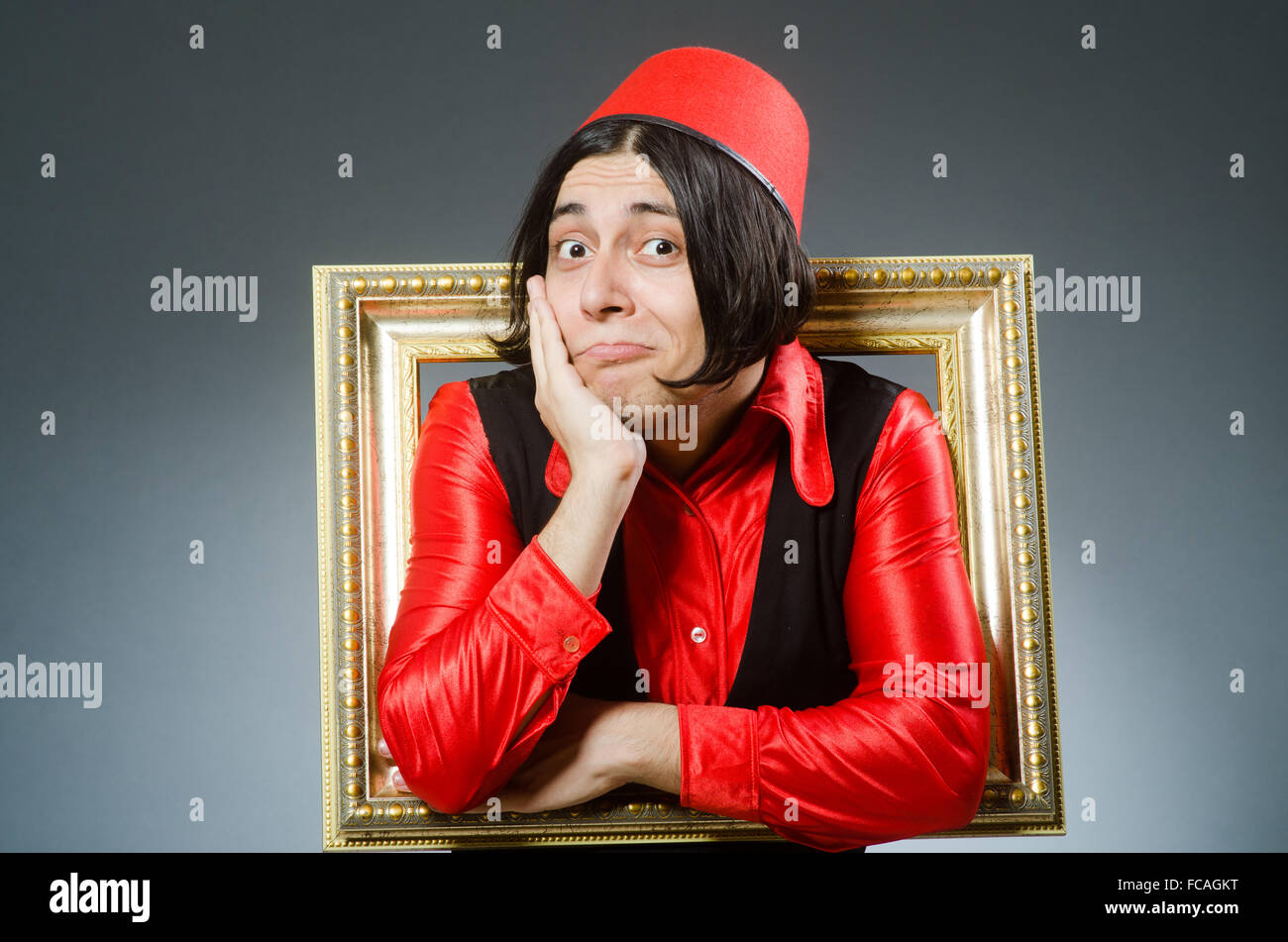 Man wearing red fez hat Stock Photo - Alamy