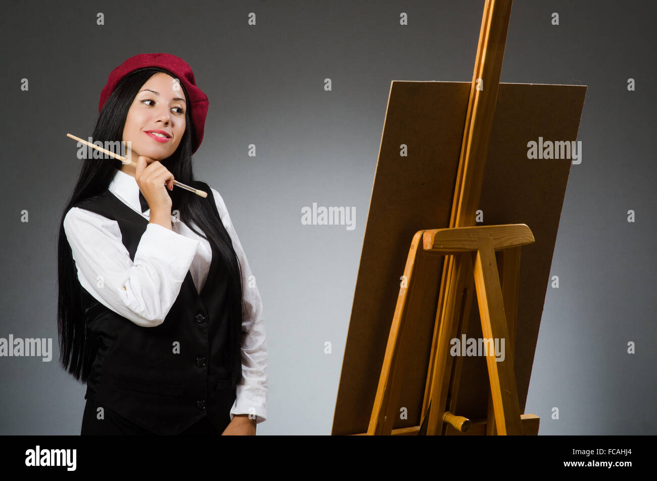 Funny artist working in the studio Stock Photo - Alamy