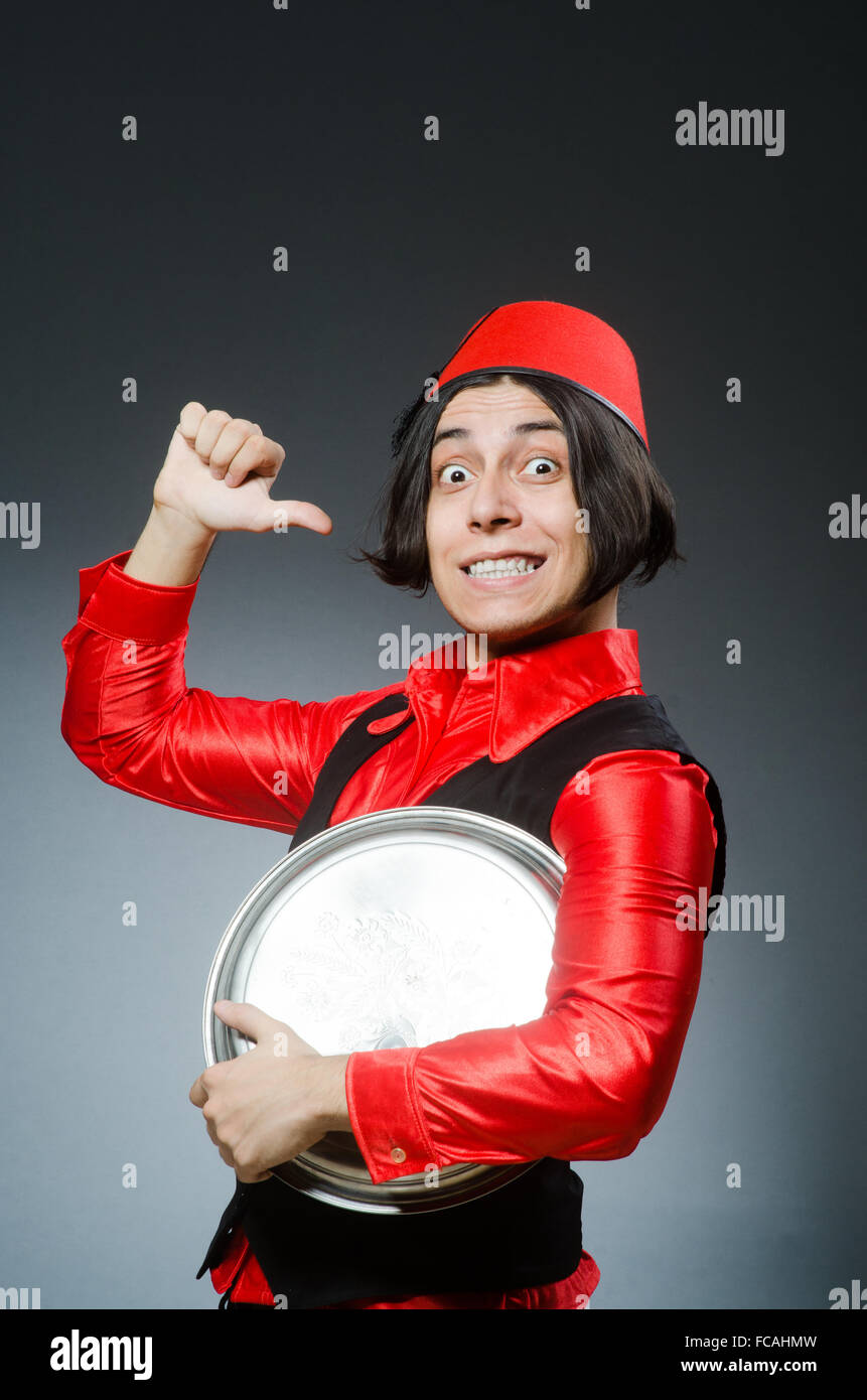 Man wearing red fez hat Stock Photo - Alamy