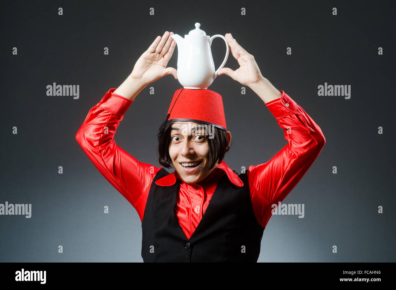 Man wearing red fez hat Stock Photo - Alamy