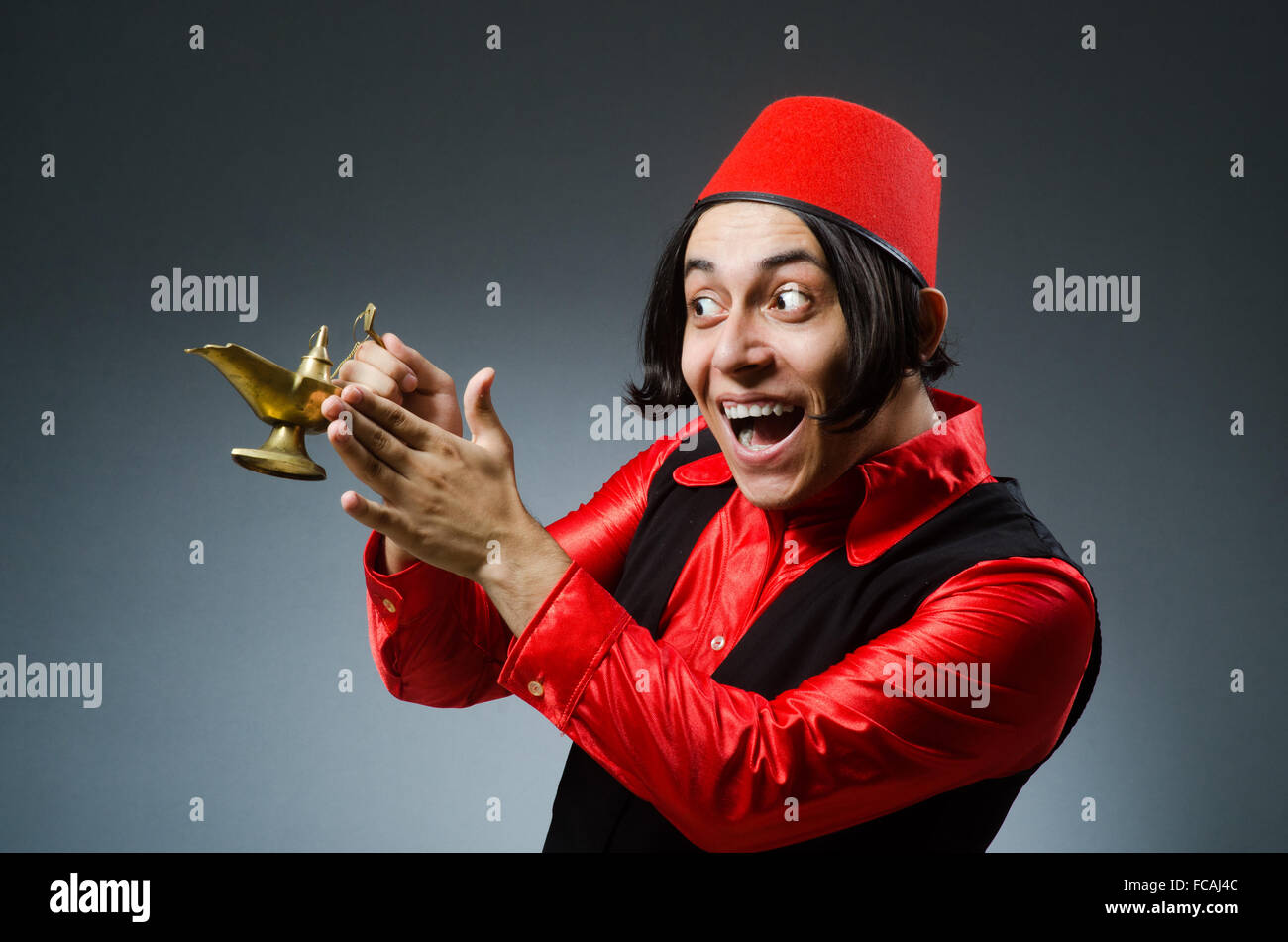 Man wearing red fez hat Stock Photo - Alamy