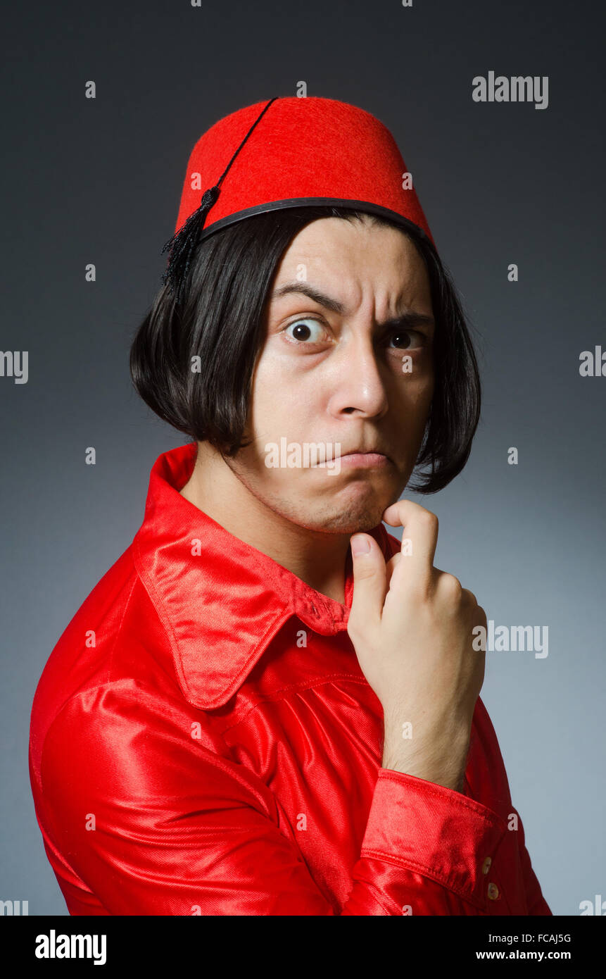 Man wearing red fez hat Stock Photo - Alamy