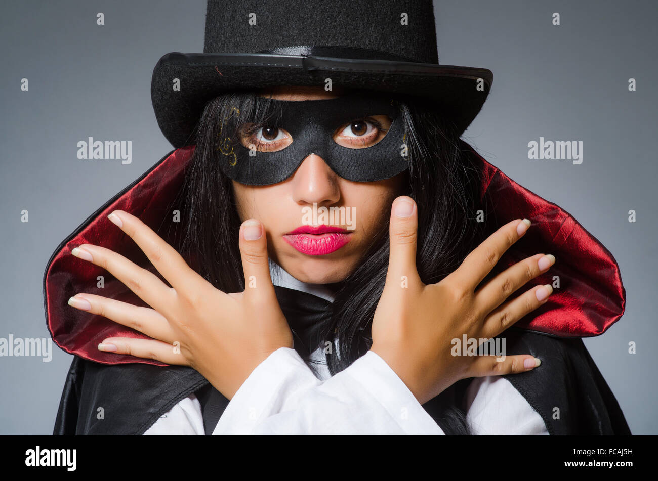 Woman magician in funny concept Stock Photo - Alamy