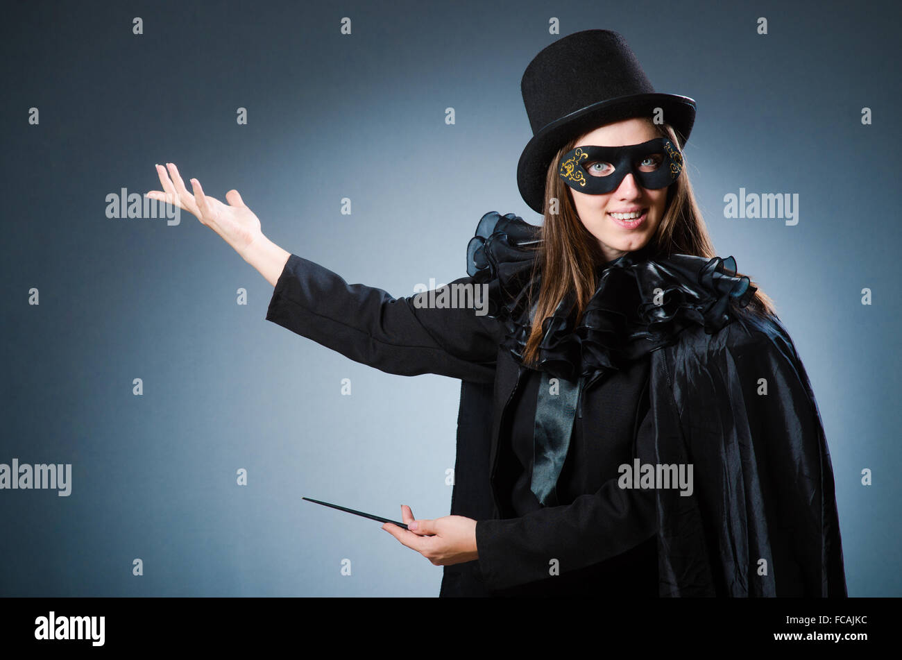 Woman magician in funny concept Stock Photo - Alamy