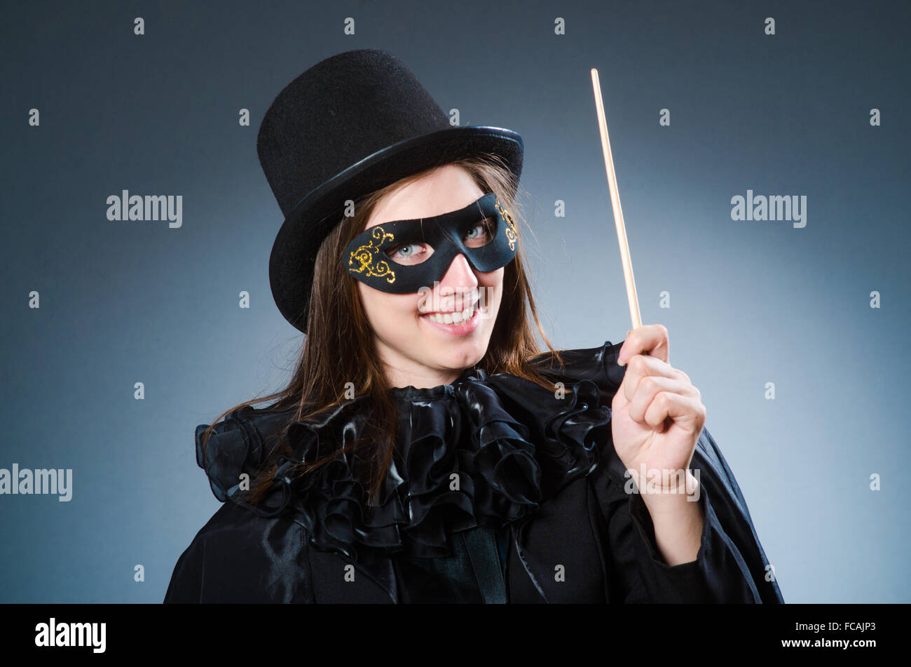Woman magician in funny concept Stock Photo - Alamy