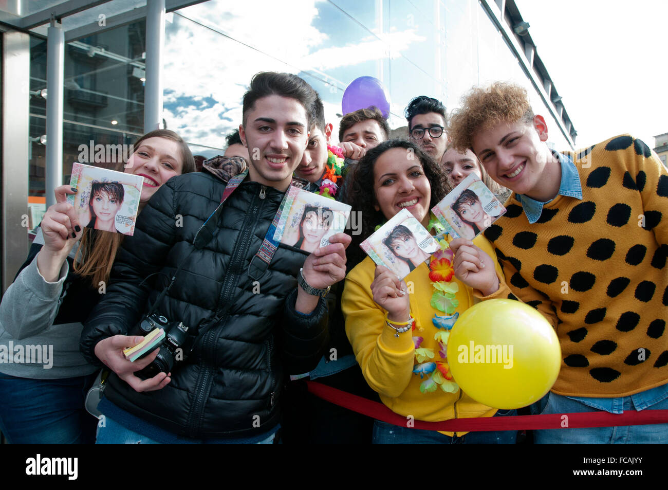 Alessandra Amoroso's fans holding their album copy of her. The great ...