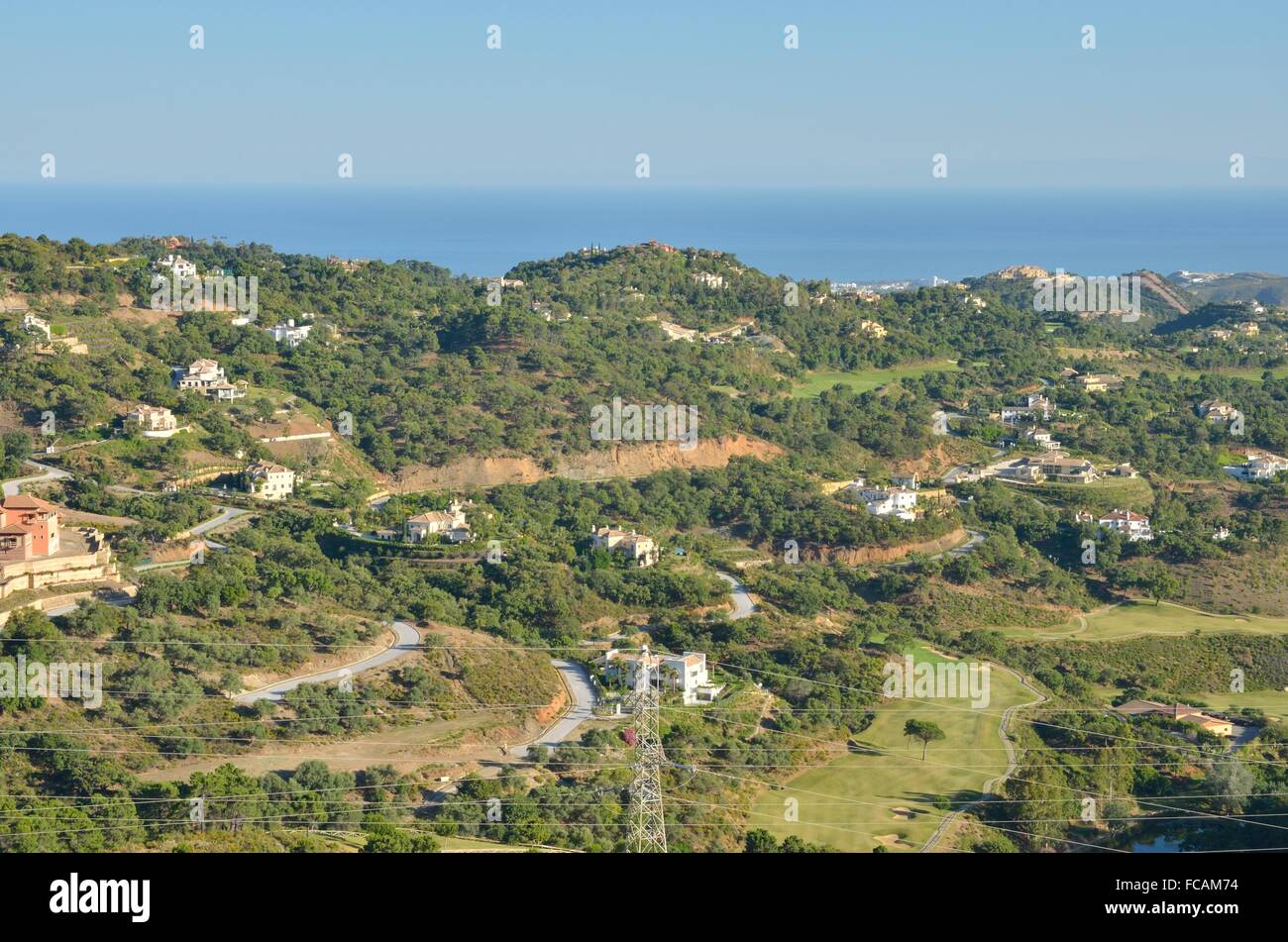 Luxury villas on a golf course in a valley next to the Mediterranea sea ...
