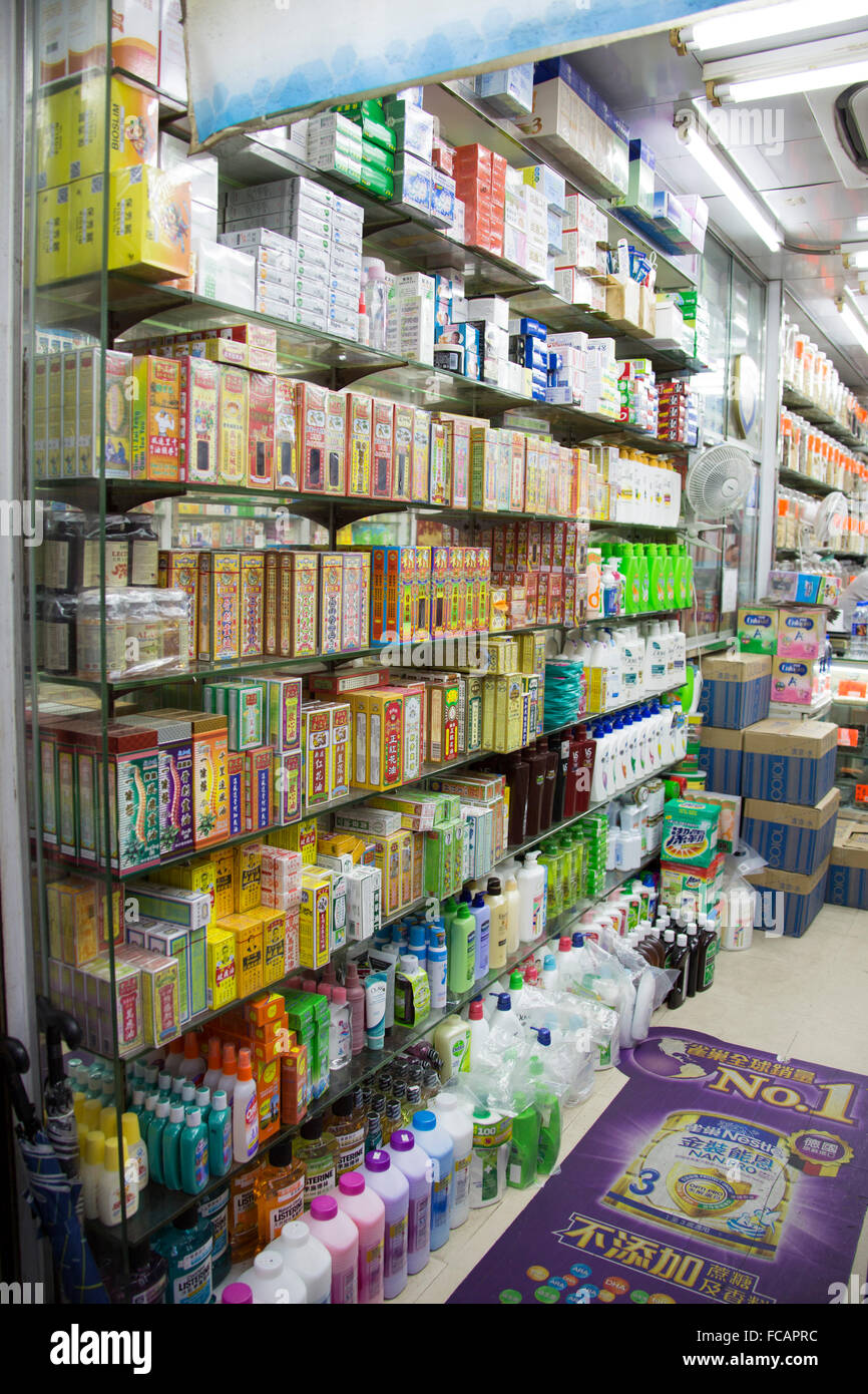 Drugstore shop in Hong Kong. Full shelves with products, boxes ...