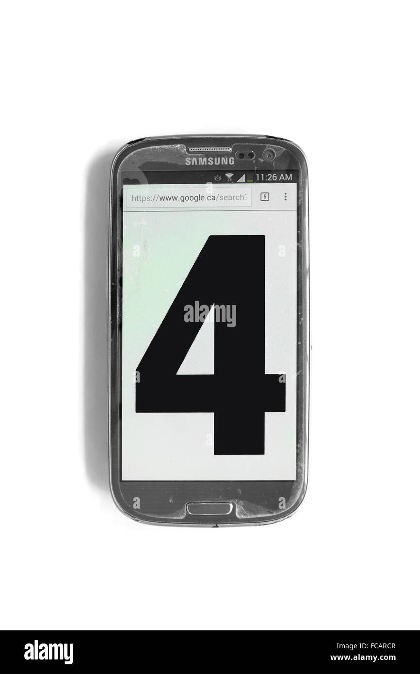 4 on the screen of smartphones photographed against a white background ...