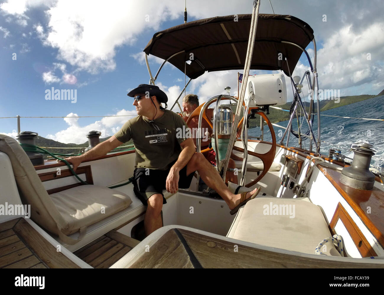 Two men sailing in the Caribbean Stock Photo - Alamy