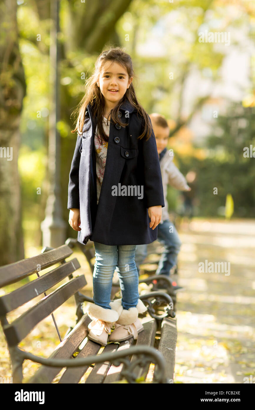 Children on the bench Stock Photo - Alamy