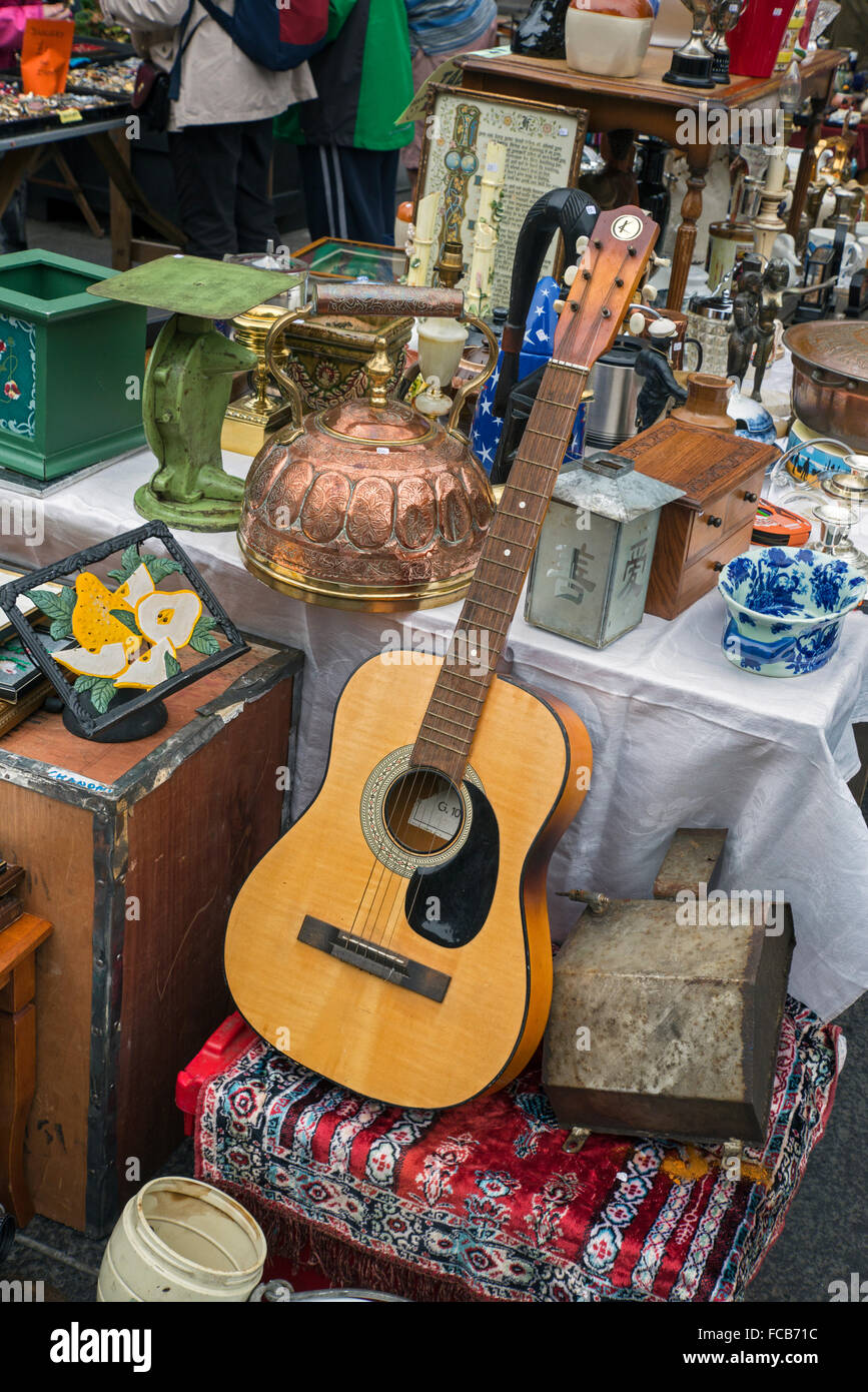 A guitar and various items on a fleamarket stall in Edinburgh's ...