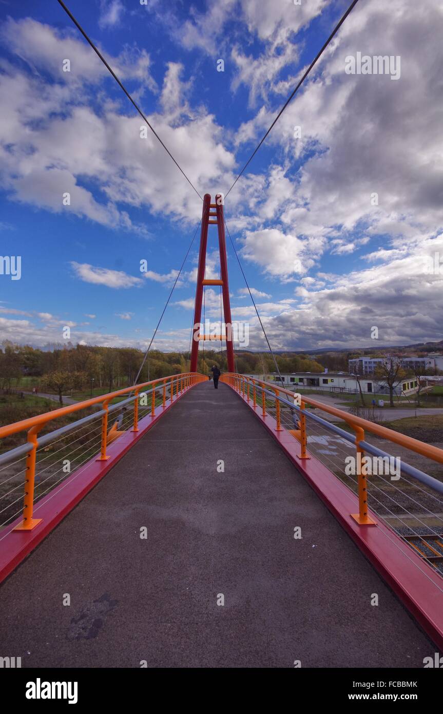 Long Empty Bridge Against Blue Sky And Clouds Stock Photo - Alamy