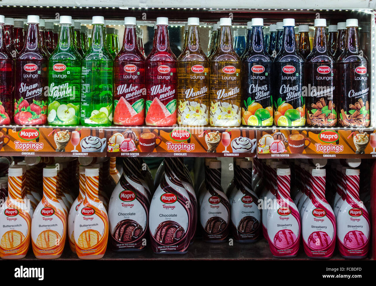 Different varieties of fruit based crushes and syrups on sale at the ...