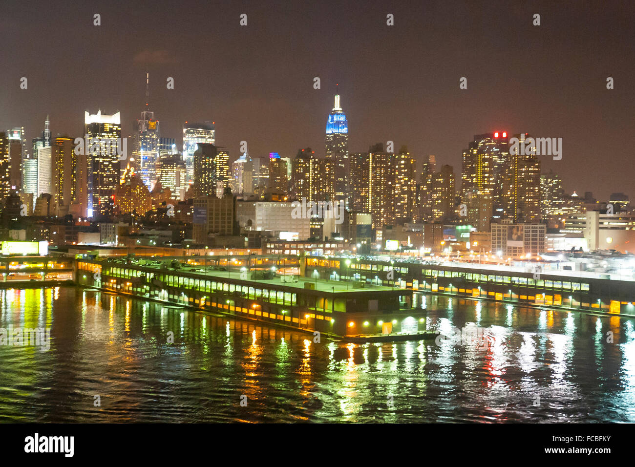 The panorama of Midtown Manhattan coast and ships pier viewed from the ...